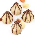 Buy Jaiccha Ghasitaram Sweets-Chocolate Drape Kaju Modak 400 gms Online ...