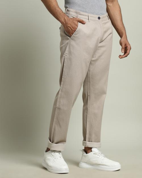 Buy Men Tapered Fit Flat-Front Trousers Online at Best Prices in India ...