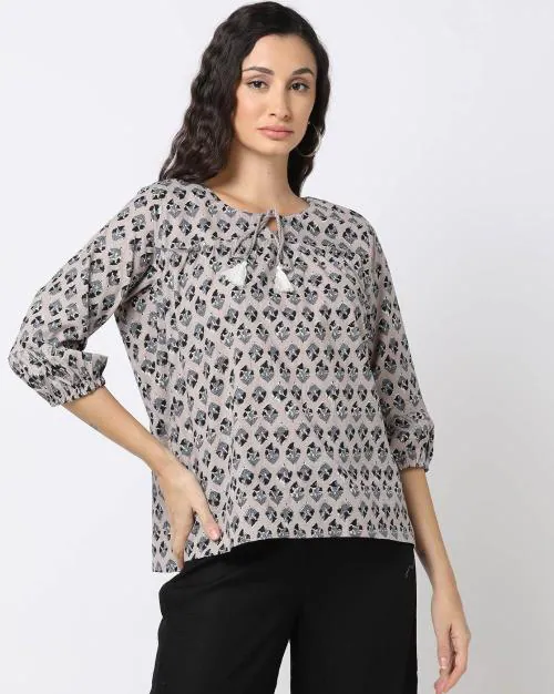 Buy Women Floral Print Regular Fit Top with Tie-Up Neck Online at Best ...