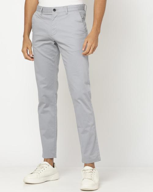 Buy Men Tapered Fit Flat-Front Chinos Online at Best Prices in India ...