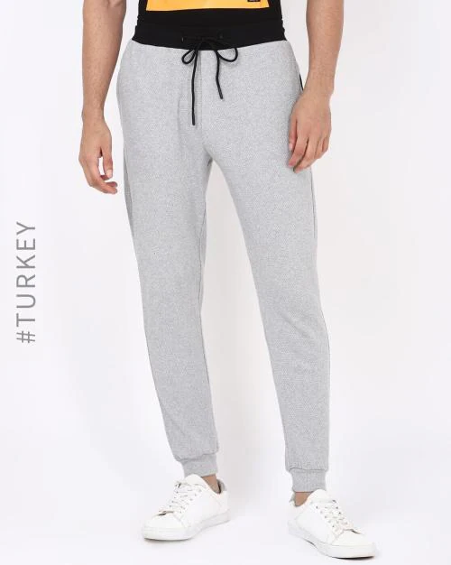 Buy Relaxed Fit Joggers with Insert Zip Pockets Online at Best Prices ...