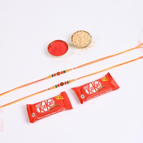 Buy Designer Rudraksh Rakhi with two KitKat Chocolate Pack Of 2 Online ...