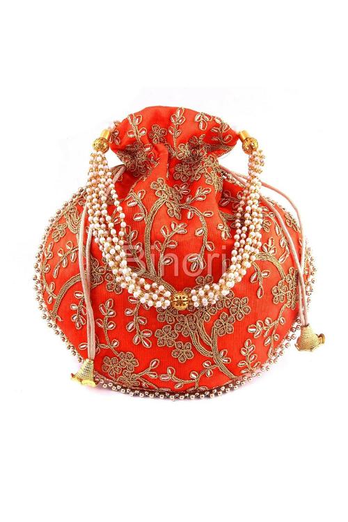 Buy Binori Orange Rajasthani Style Royal Clutch Silk Potli Online at ...
