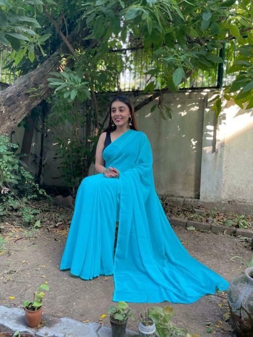 Buy Anand Women Light Blue Solid Georgette Single Saree Online at Best ...