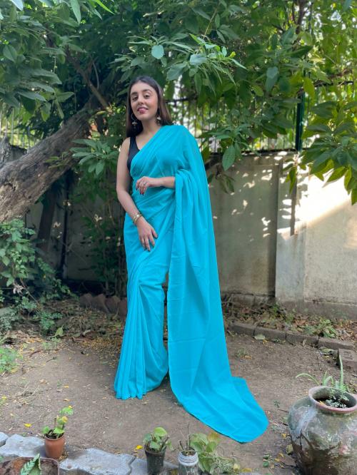 Buy Anand Women Light Blue Solid Georgette Single Saree Online at Best ...