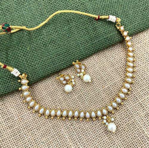 Buy Manath Copper Earring and Necklace Set (White) Online at Best ...