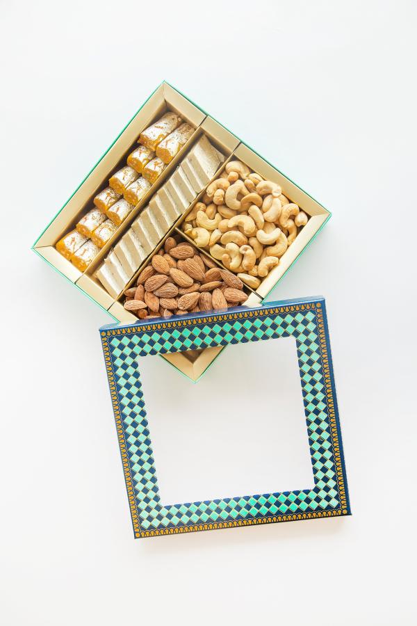 Kesar Sweets| Sweets & Snacks - Kaju Katli & Kesar Kaju Roll, Cashew ...