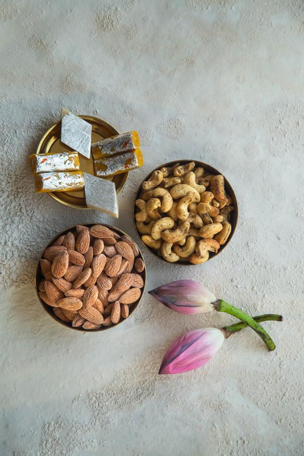 Kesar Sweets| Sweets & Snacks - Kaju Katli & Kesar Kaju Roll, Cashew ...